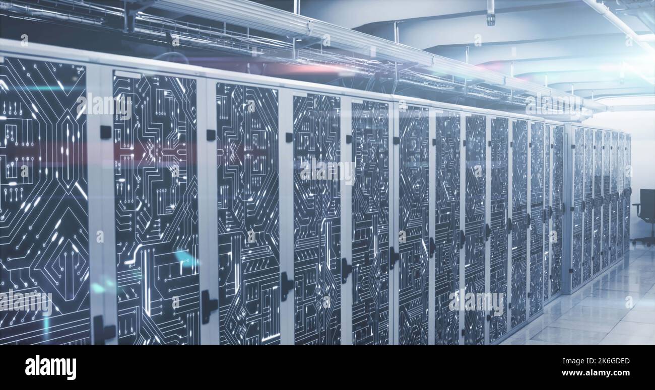 Composition of computer circuit board over server room Stock Photo - Alamy