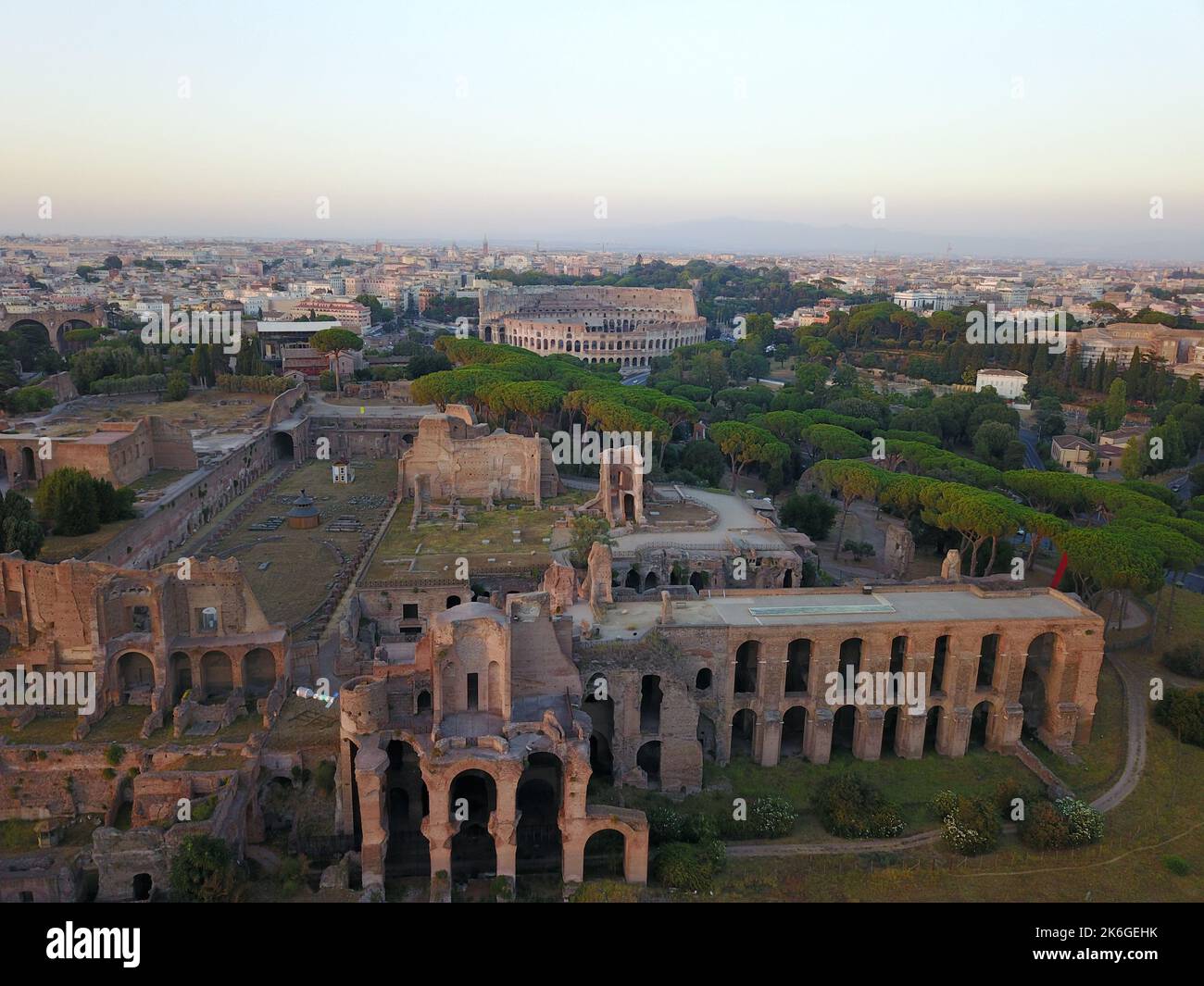 An aerial view of historic stone ruins and the Colosseum in Rome, Italy ...