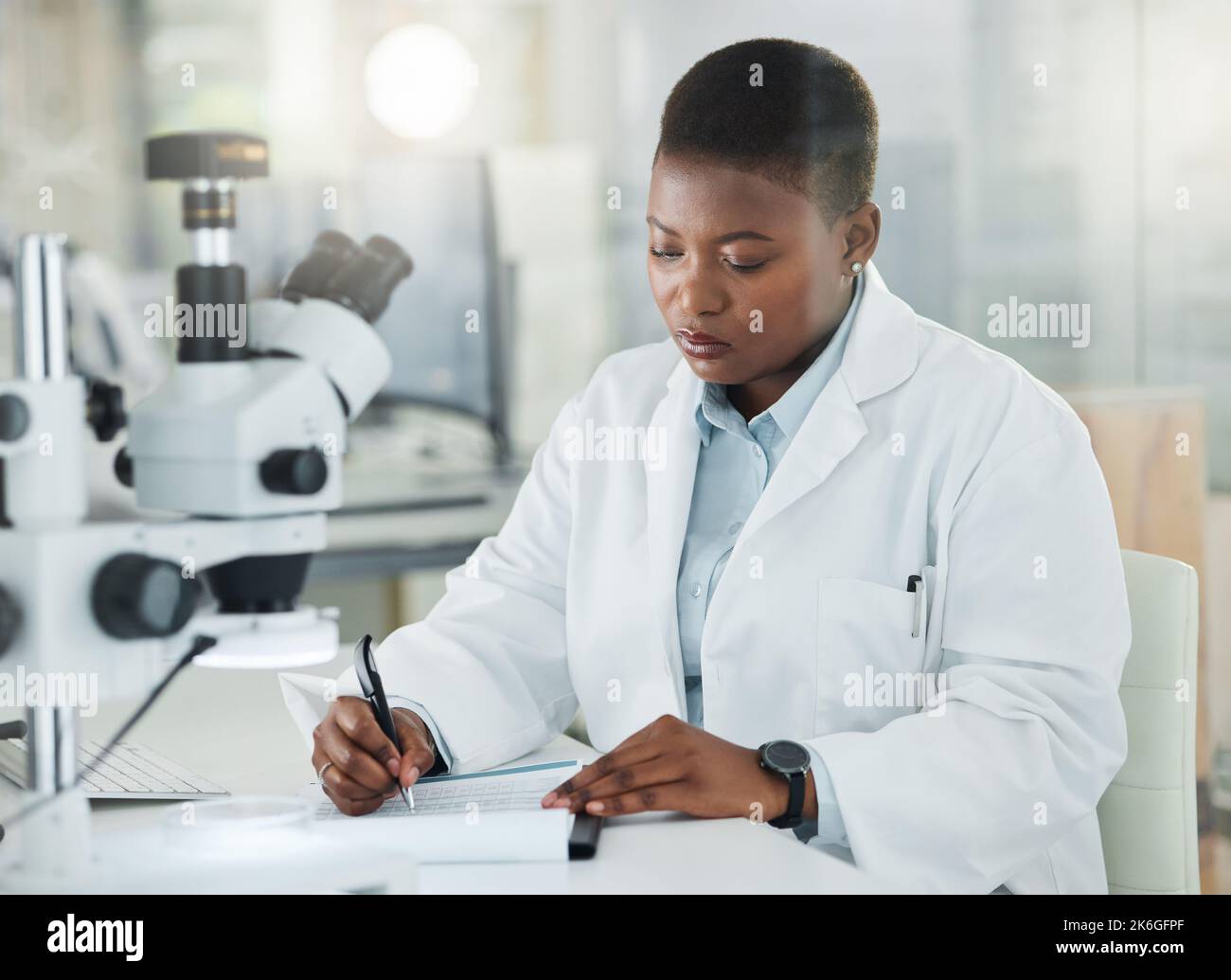 Aiming to produce precise data after thorough analysis. a young ...