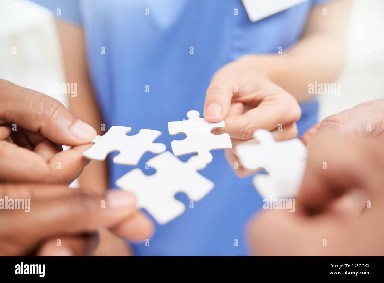 Reaching solutions as a collective. Closeup shot of a group of medical ...