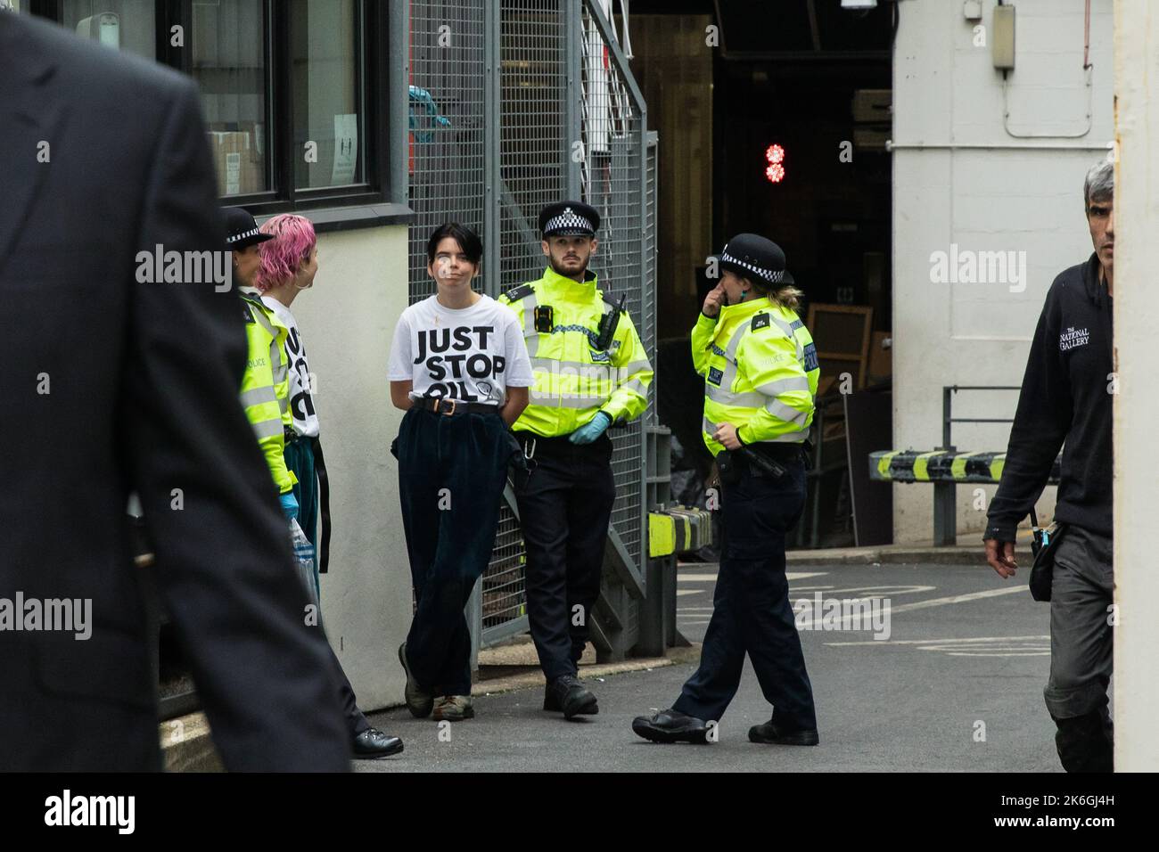 London, UK. 14th October, 2022. Two Just Stop Oil activists are ...