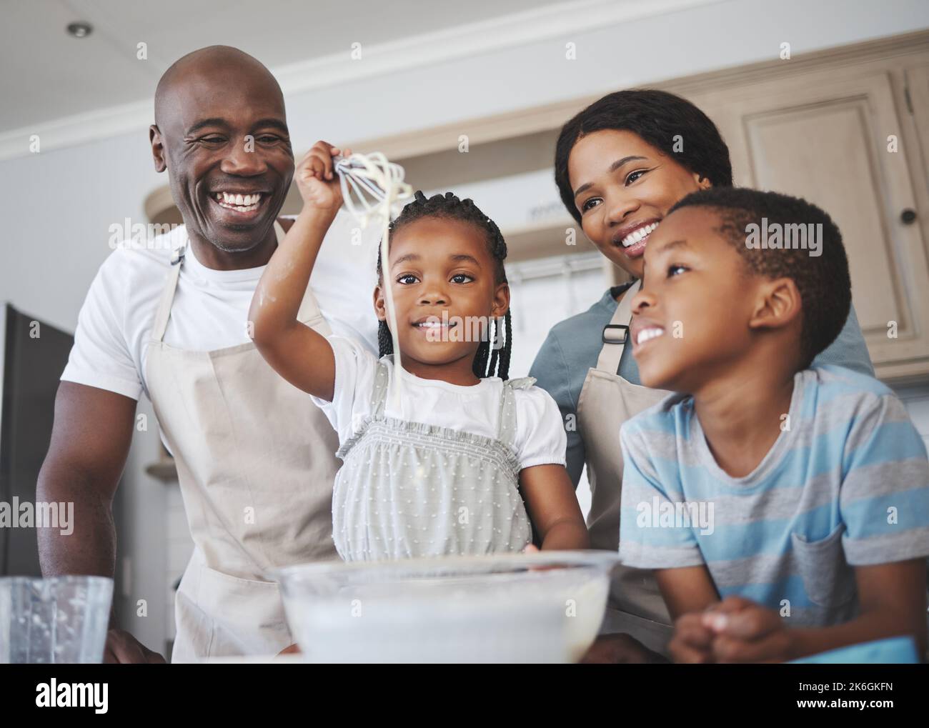 Respect and enjoy each others life. a family baking together in the ...