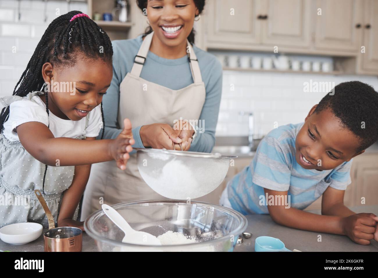 Cooking and baking is both physical and mental therapy. a mother baking ...