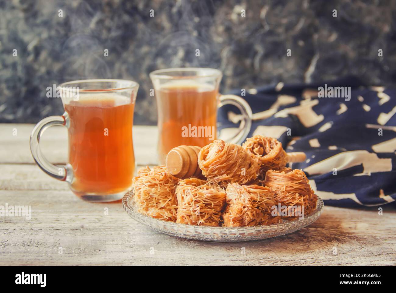 Eastern sweetness, baklava with peanuts and honey. Isolate. Selective ...