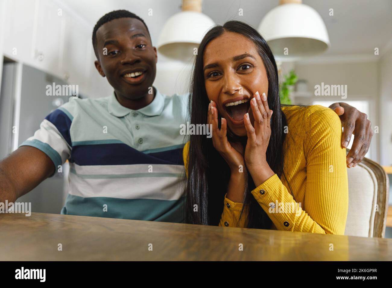 Video laughing diverse couple in hi-res stock photography and images - Alamy