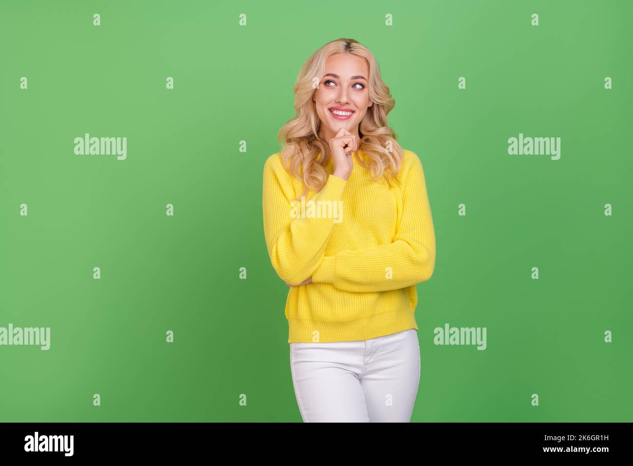 Photo of cute young blond lady look pomo wear yellow pullover isolated ...