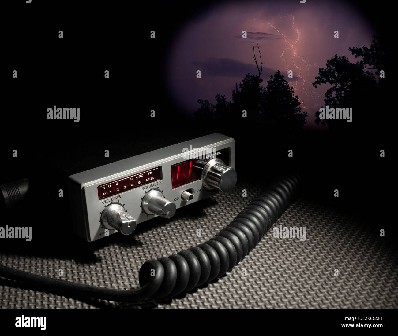 Storm building behind a survival radio on channel 11 Stock Photo - Alamy