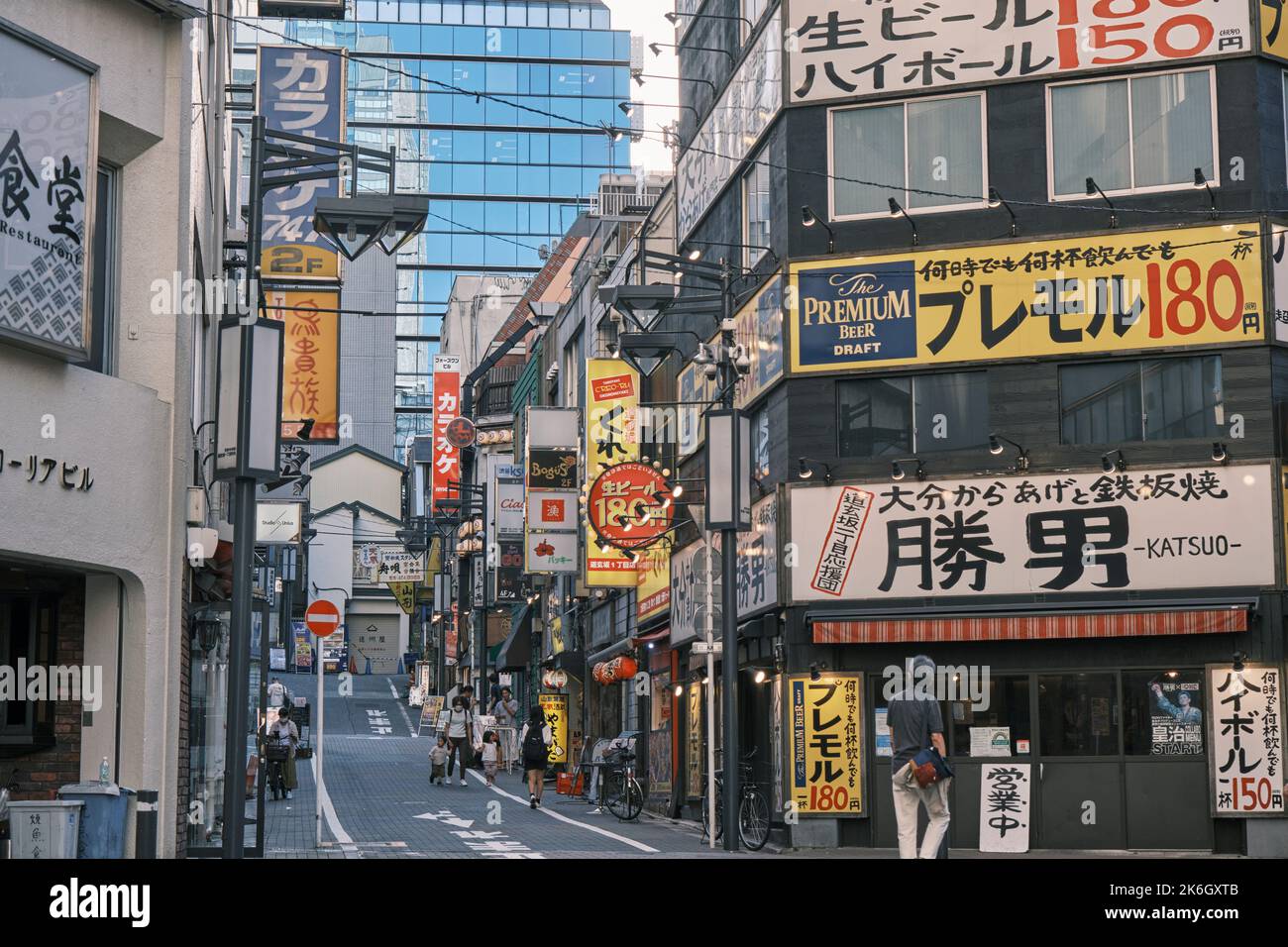 A Japanese street with shops and street sign boards in Tokyo Stock ...