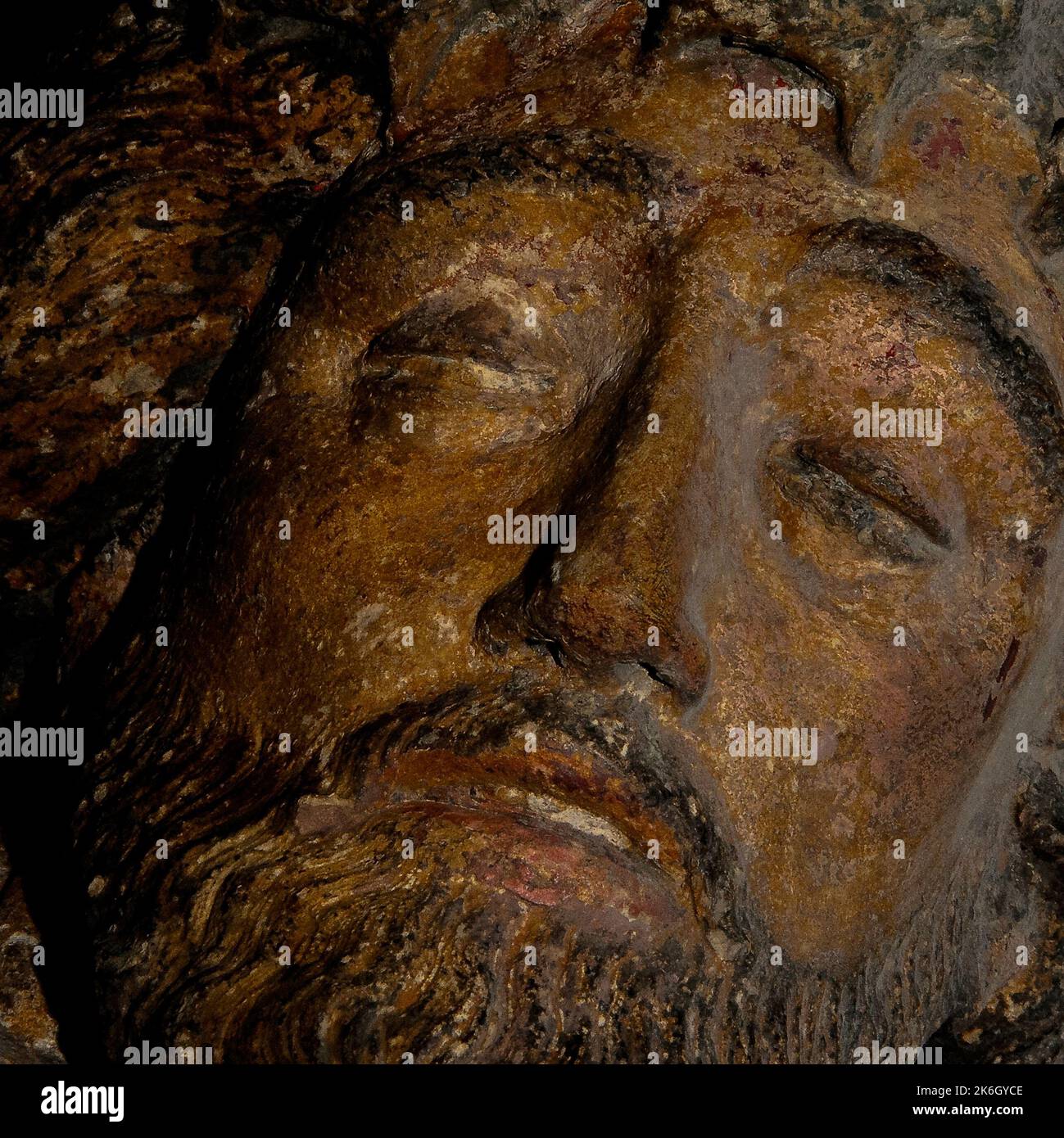 Close, square detail of the face of the Crucified Christ after his ...