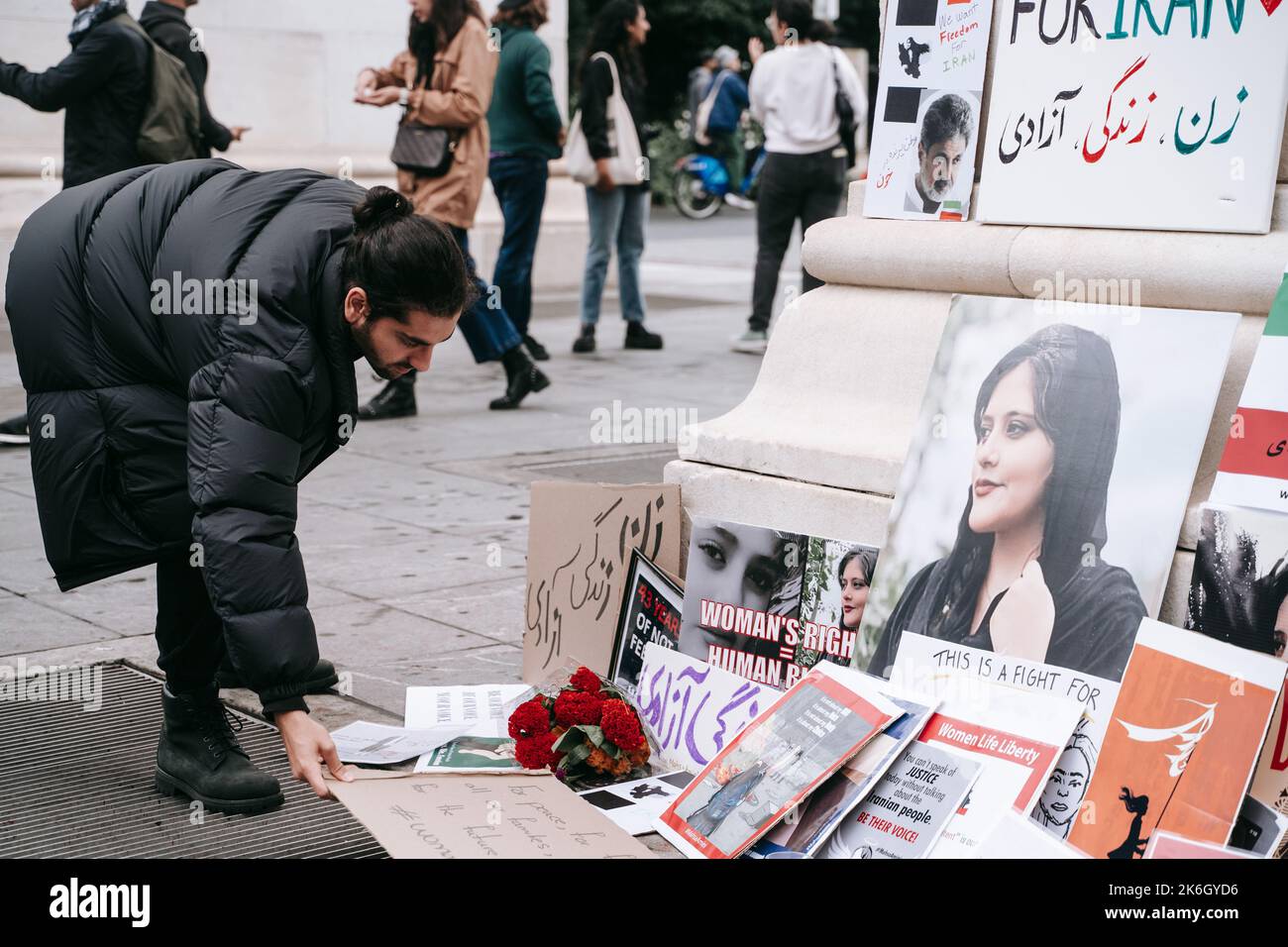New York, United States. 01st Oct, 2022. Supporter places his protest ...