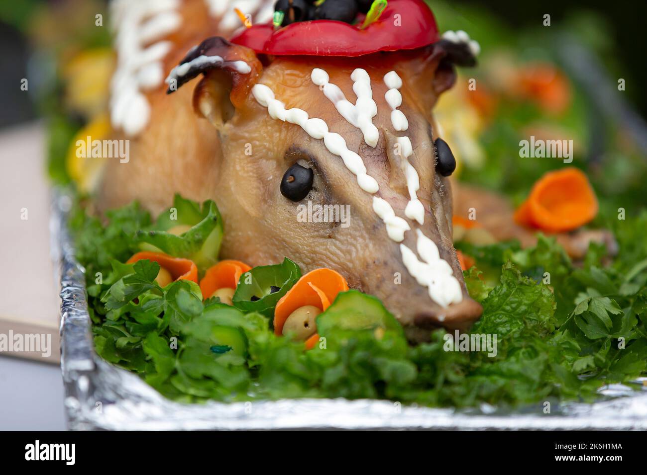 Festive food pig decorated with fruits Stock Photo - Alamy