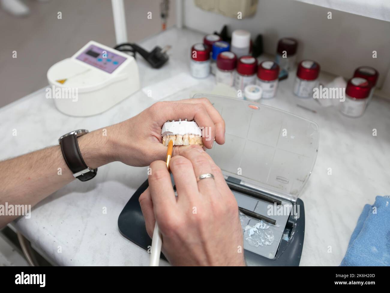 Dental device manufacturing hi-res stock photography and images - Alamy