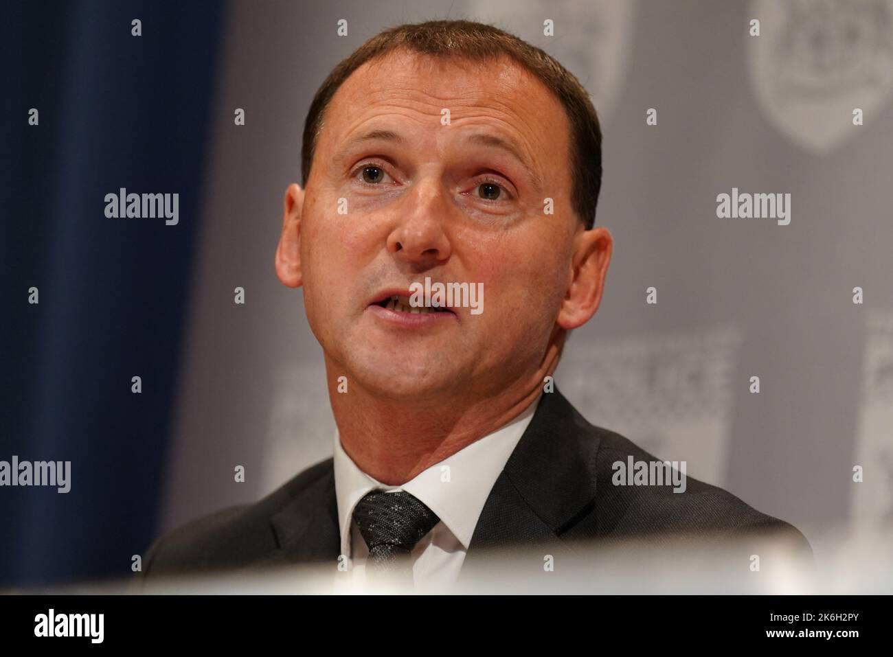 Detective Chief Superintendent Ian Hunter speaking at a press ...