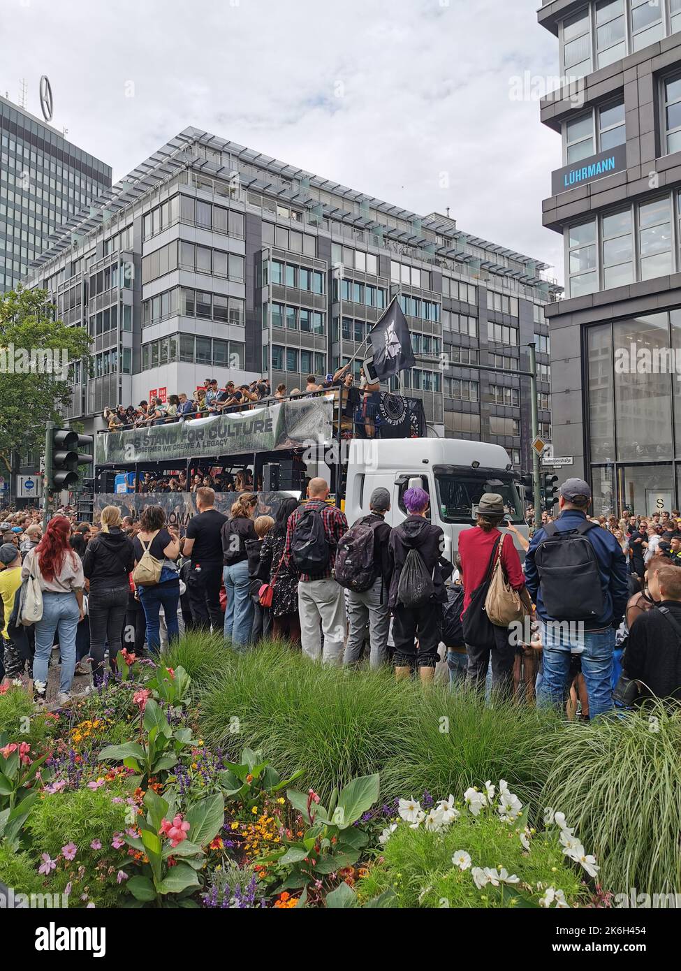 A vertical shot of the people celebrating "Rave the planet" parade in ...