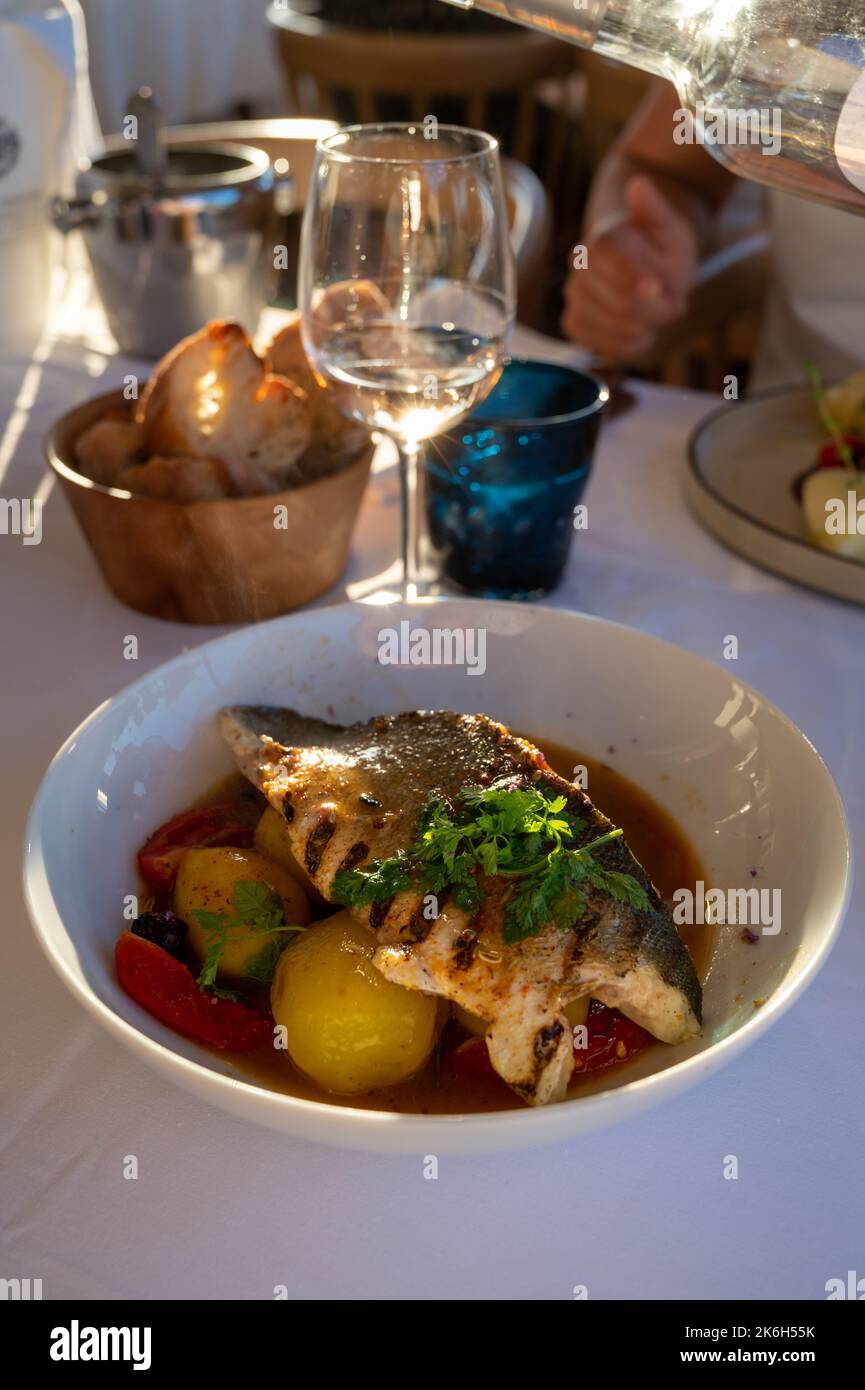 Provence cuisine, grilled filet of seabass white fish served with ...