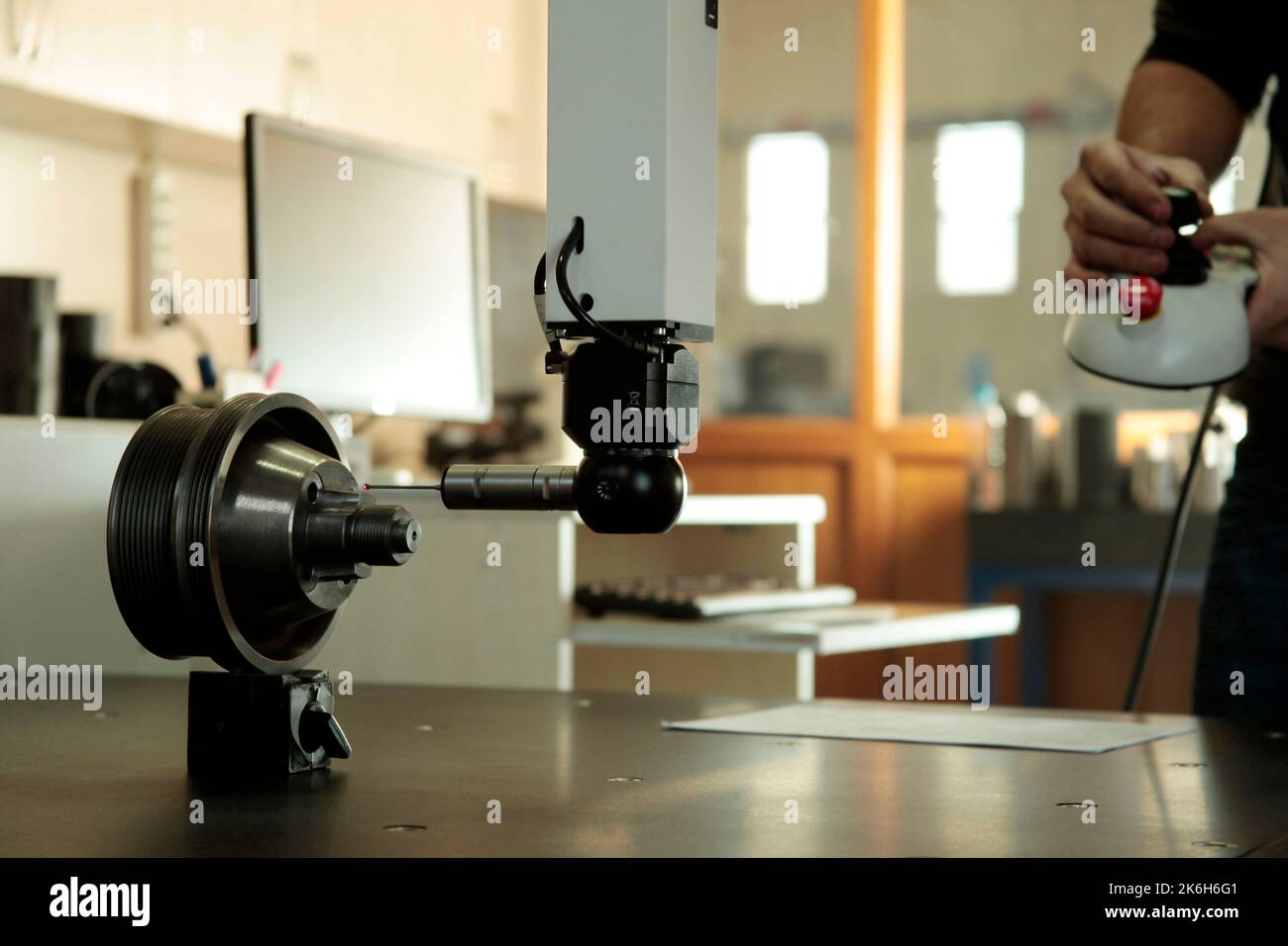 CMM probe measuring on steel cylinder. CMM probe Machine control ...