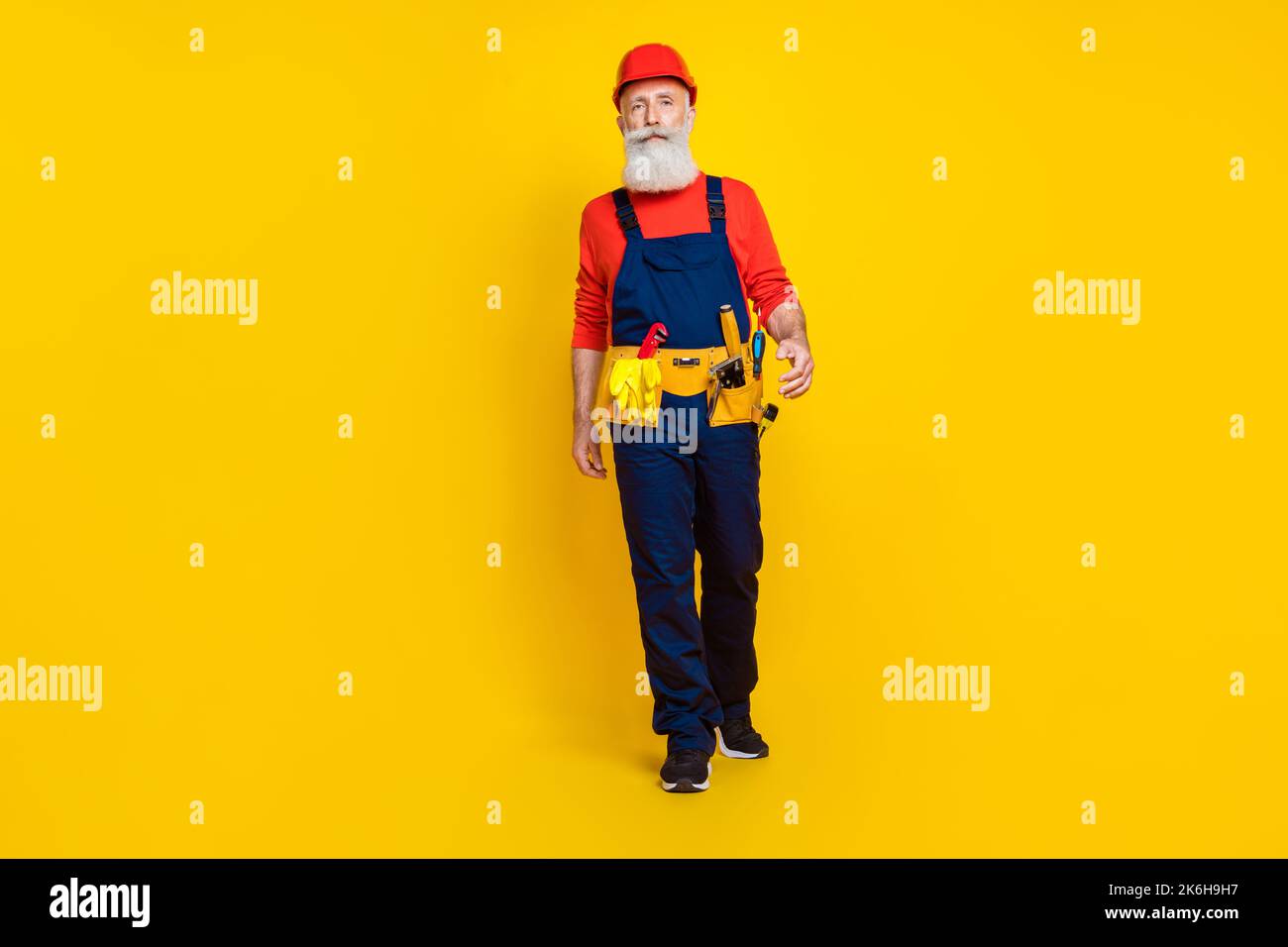 Full length photo of confident cool age man wear overall uniform red ...