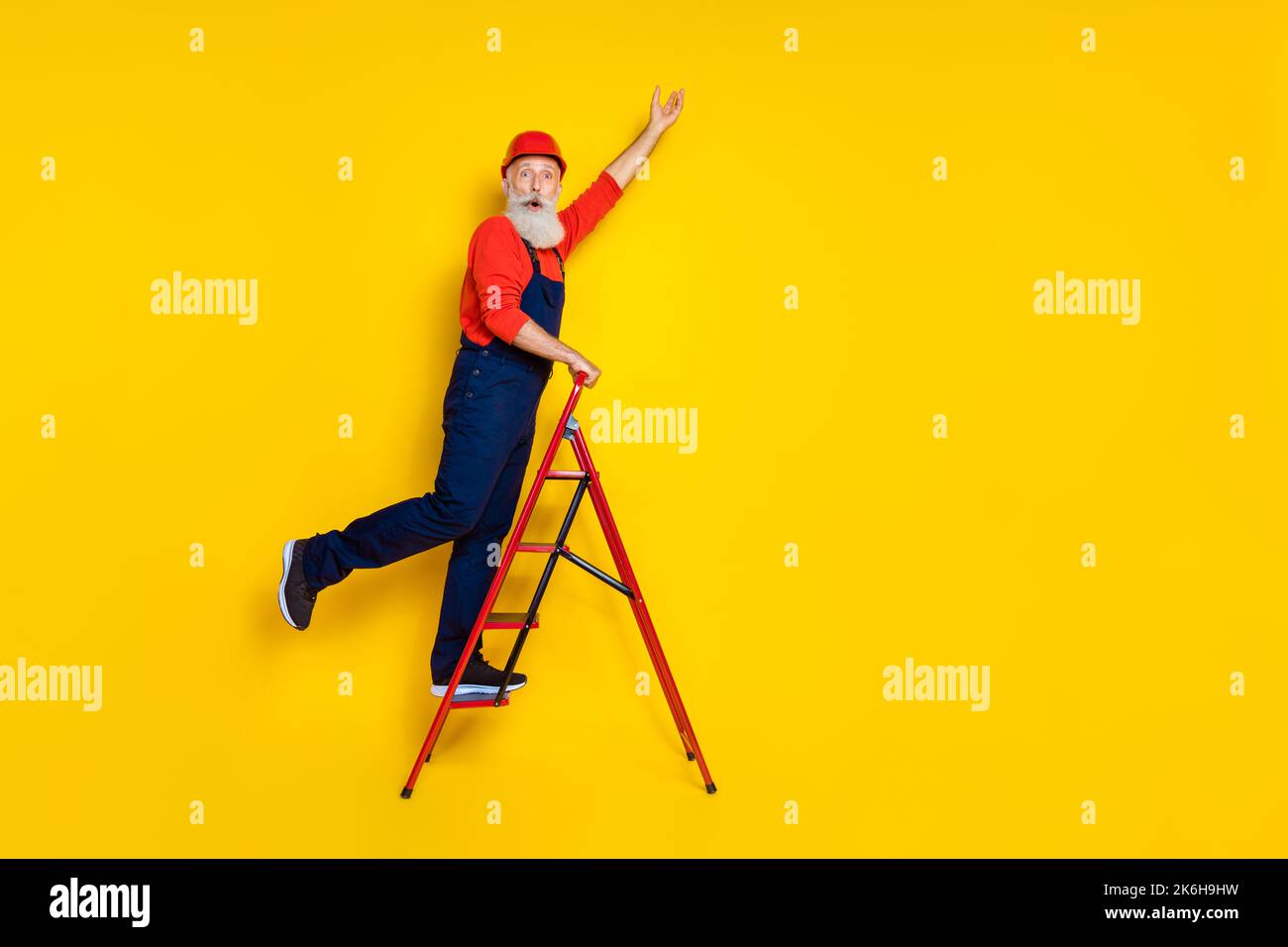 Full length photo of positive funky age man wear overall uniform red ...