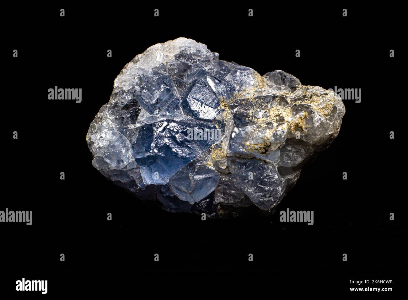 Real light blue celestine crystal cluster isolated on black background ...