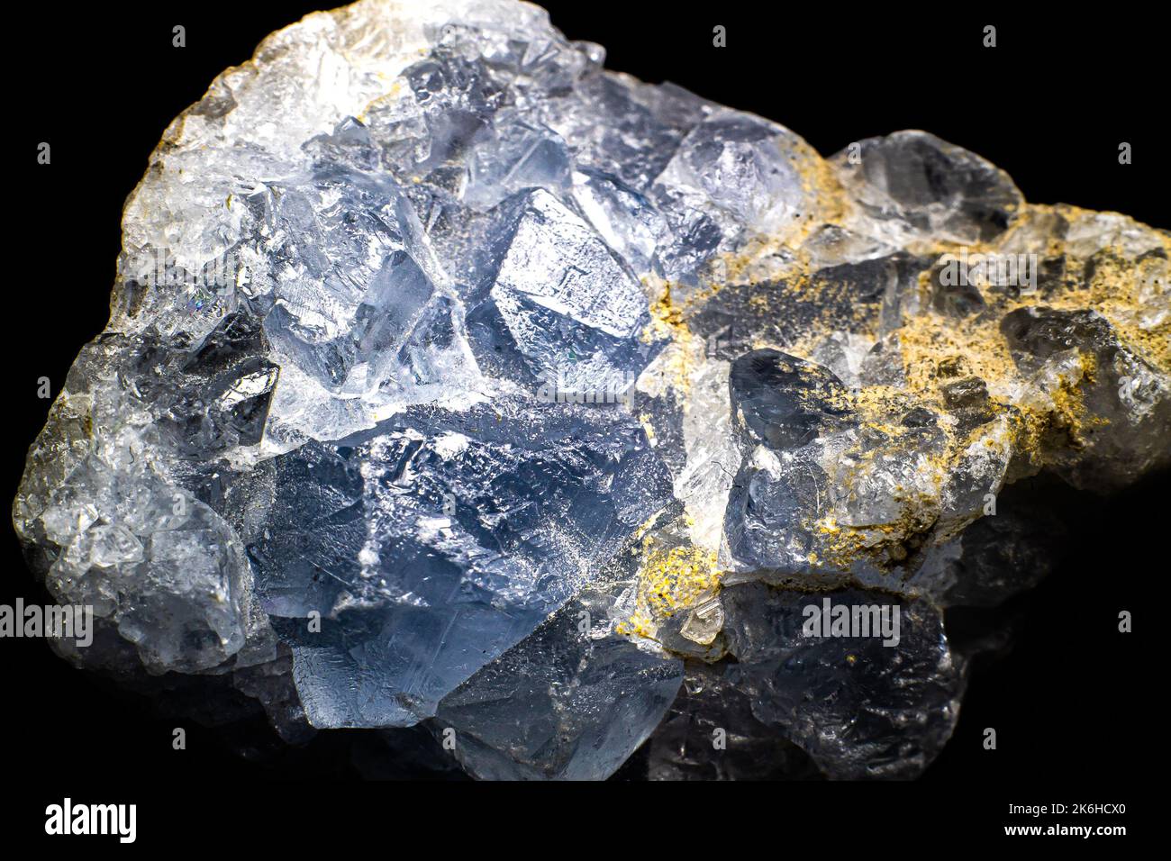 Real light blue celestine crystal cluster isolated on black background ...