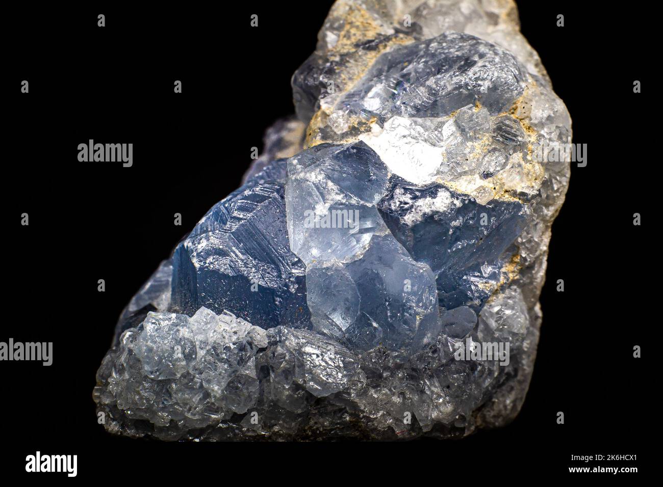 Real light blue celestine crystal cluster isolated on black background ...