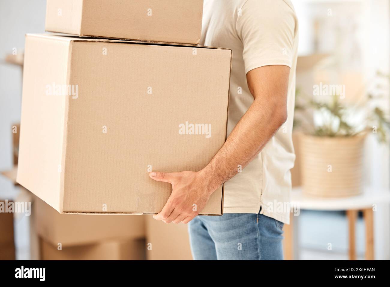 Packing up for a fresh new start. Closeup shot of an unrecognisable man ...