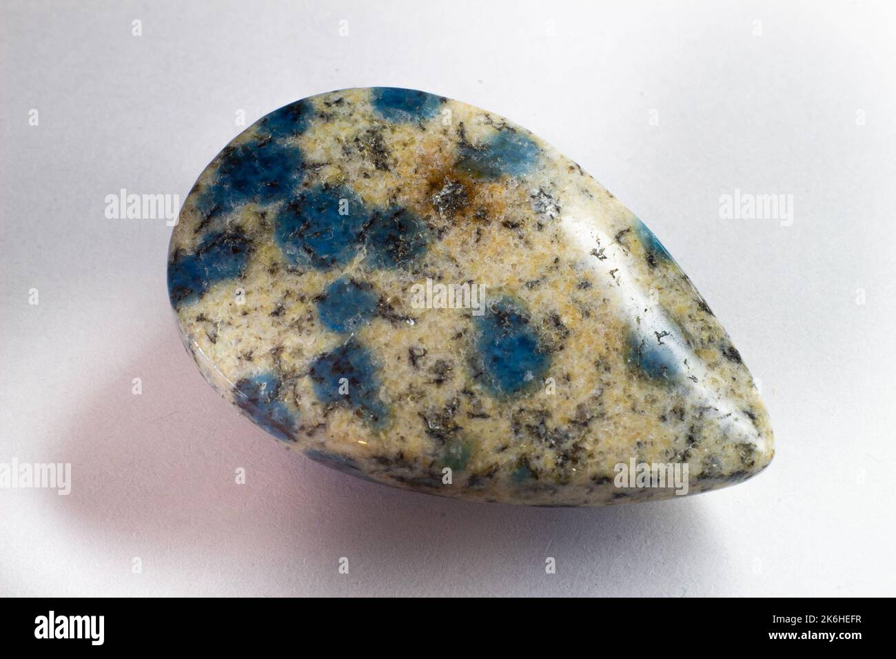 K2 Jasper, K2 granite, raindrop azurite macro photography on a white ...