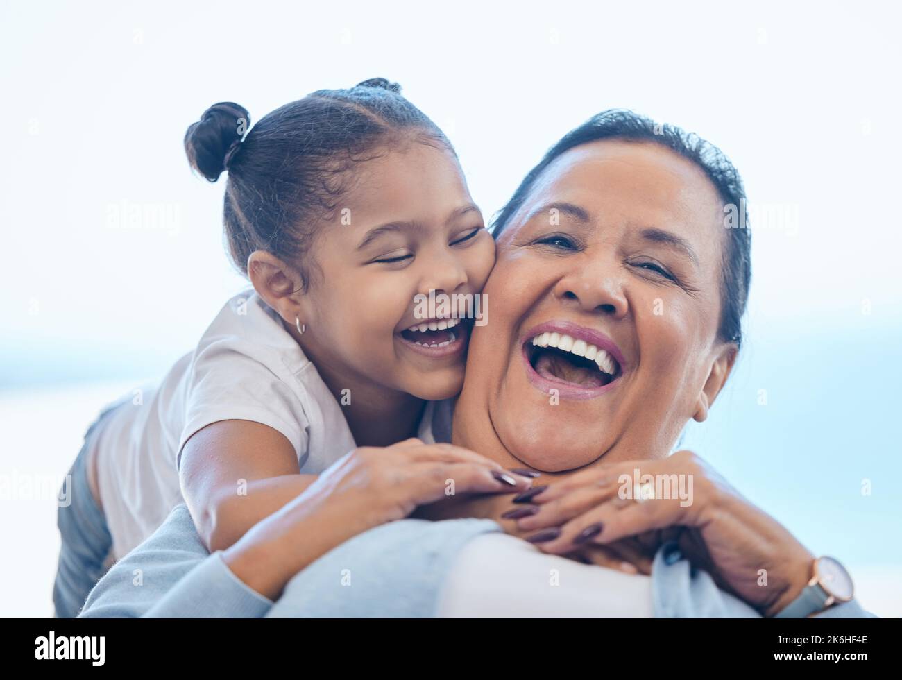 Hispanic family hugging grandmother hi-res stock photography and images ...