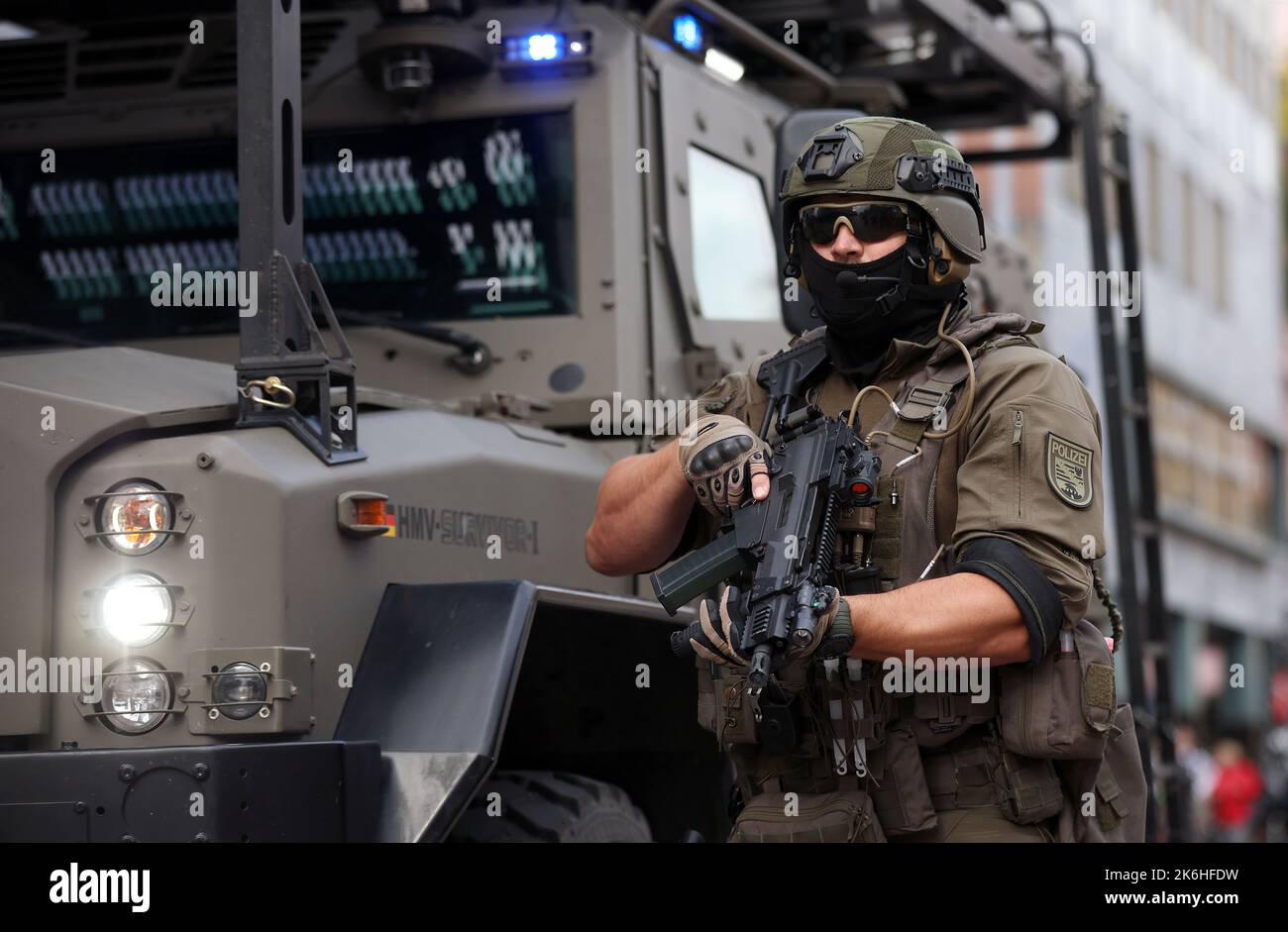 Magdeburg, Germany. 14th Oct, 2022. An officer of the SEK special unit ...