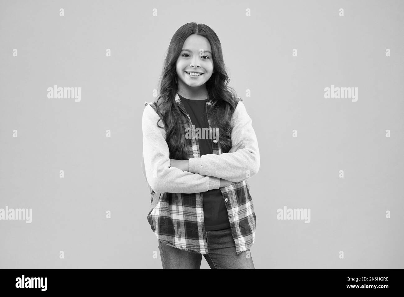 I was born to stand out. Confident girl child yellow background. Happy ...