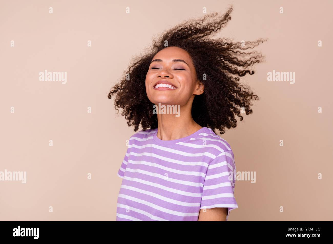 Strong wind mixed curly hair blowing hi-res stock photography and ...