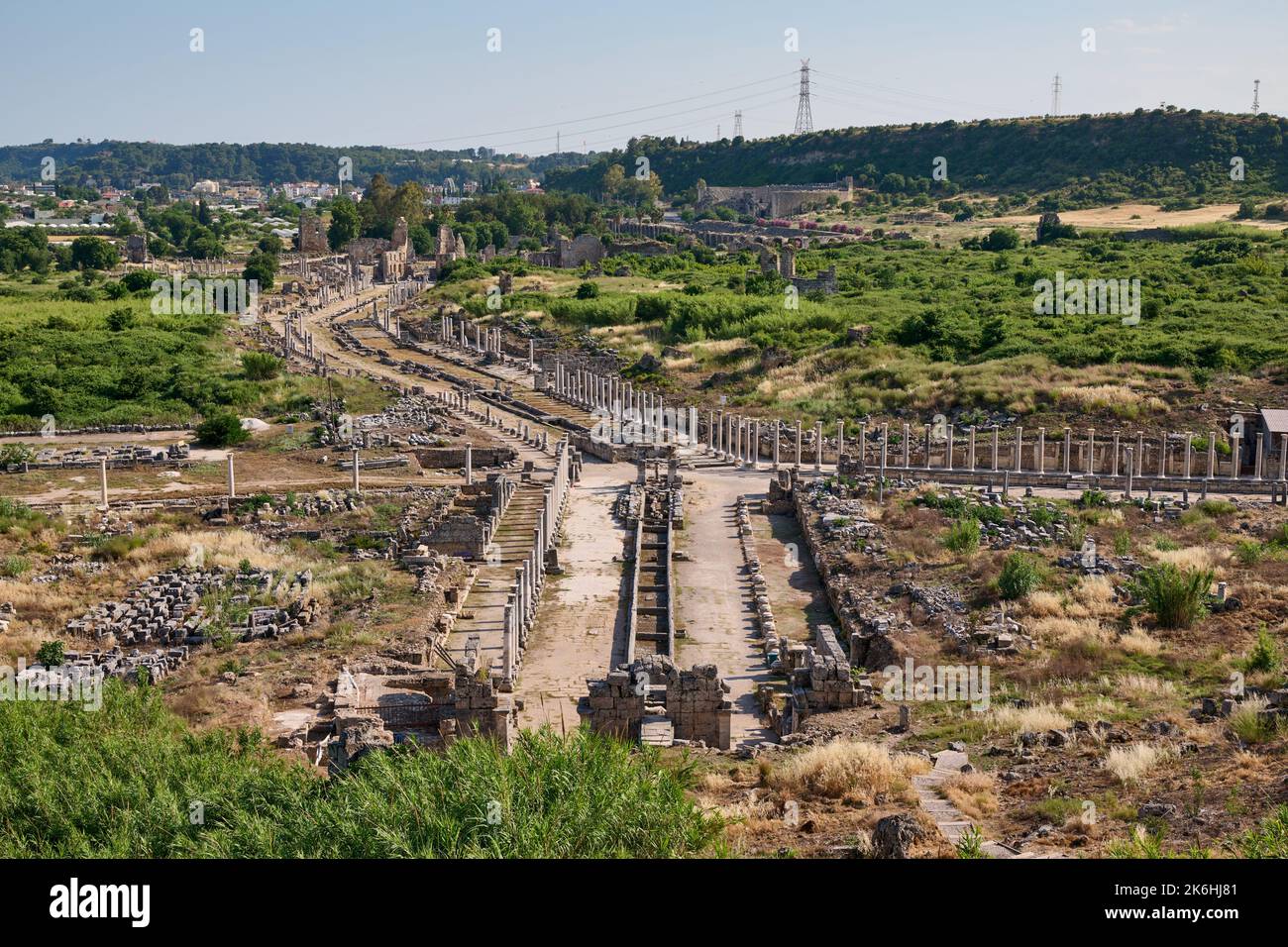 Aerial of columned street in the ruins of the Roman city of Perge ...
