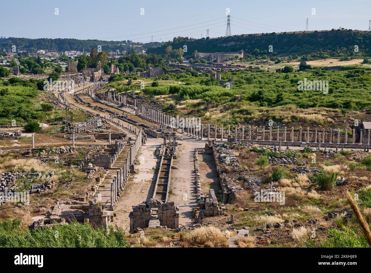 Aerial of columned street in the ruins of the Roman city of Perge ...