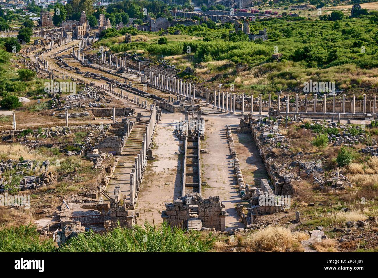 Aerial of columned street in the ruins of the Roman city of Perge ...