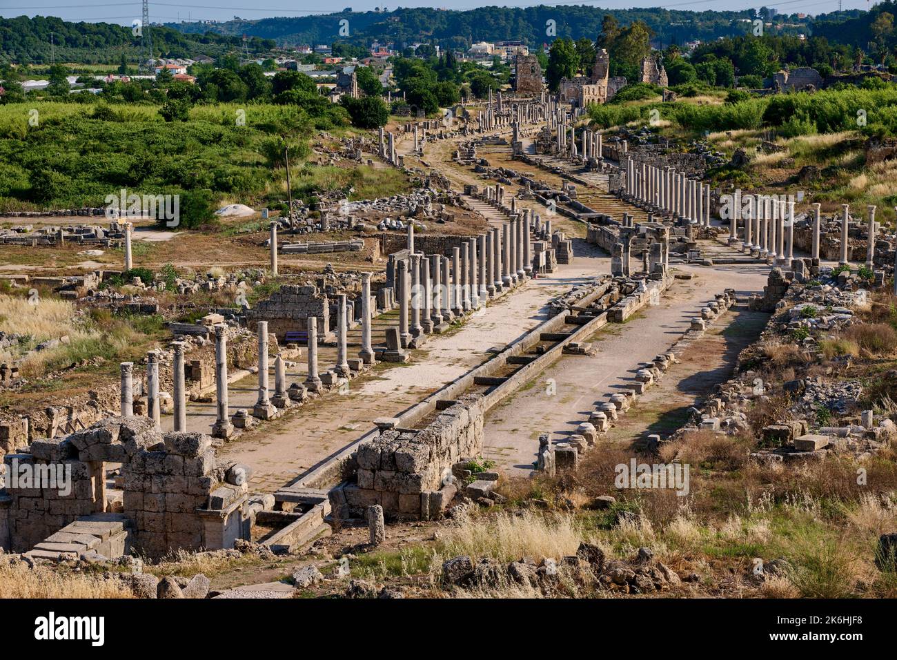 Aerial of columned street in the ruins of the Roman city of Perge ...