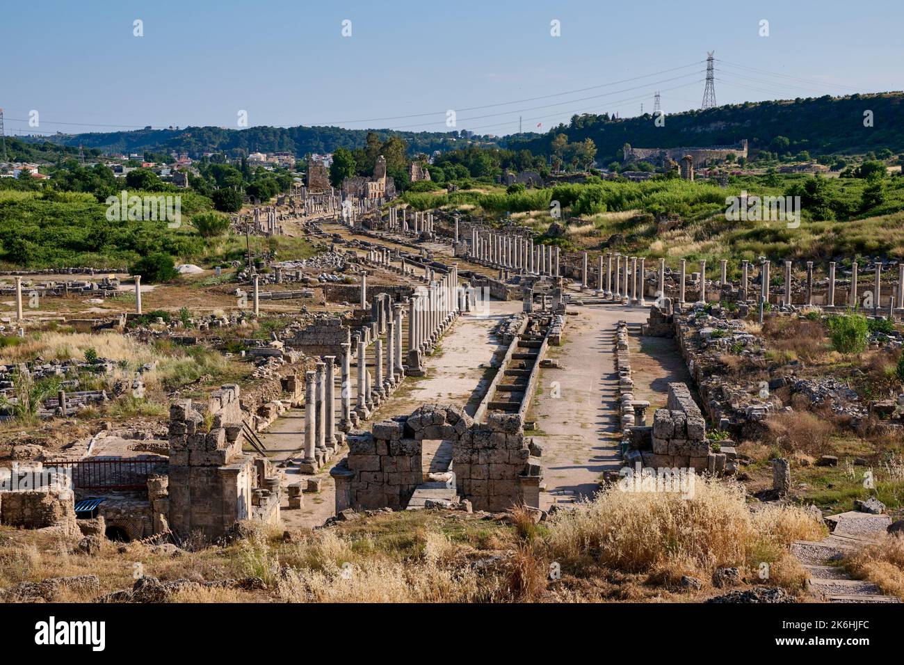 Aerial of columned street in the ruins of the Roman city of Perge ...