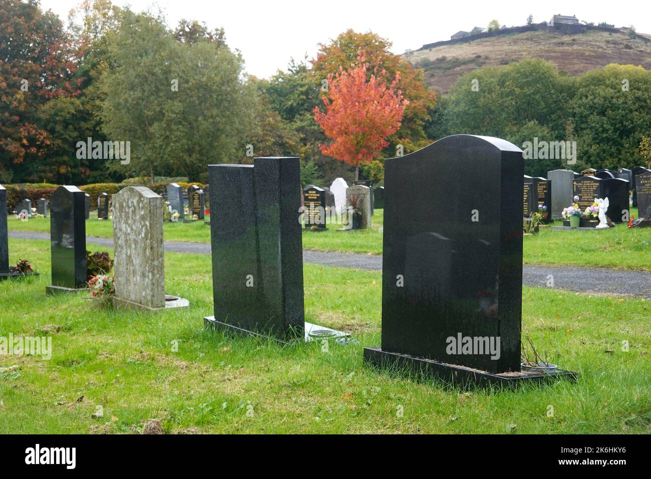 Autumn leaves shine out among the graves in Thorniest Cemetery ...
