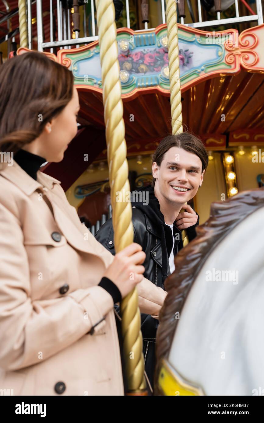 Woman riding carousel horse hi-res stock photography and images - Alamy