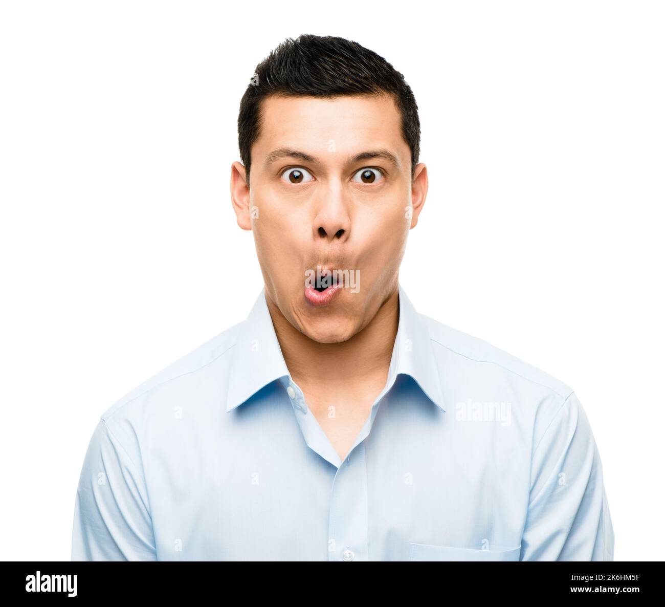 Stretching those facial muscles. a young businessman making a silly ...