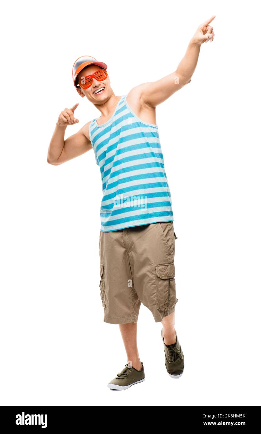 Show off those muscles. a young bodybuilder flexing his muscles against ...