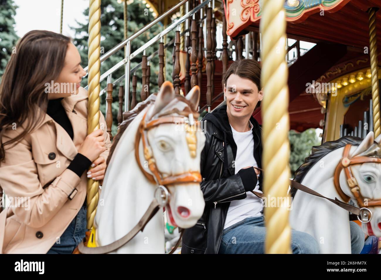 Woman riding carousel horse hi-res stock photography and images - Alamy