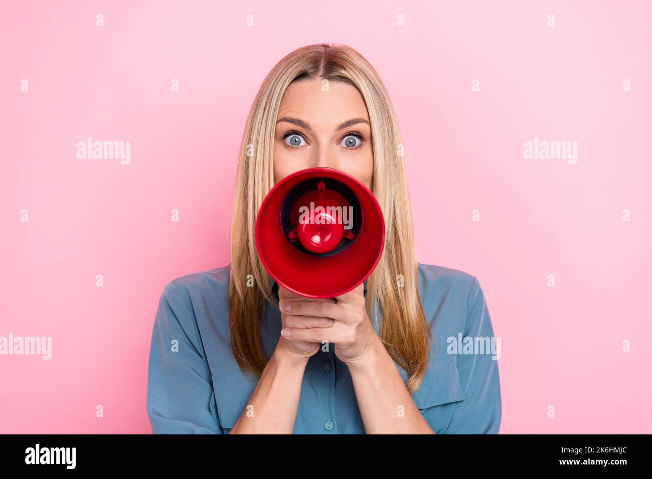 Closeup photo of young pretty cute woman wear formal blue blouse hold ...
