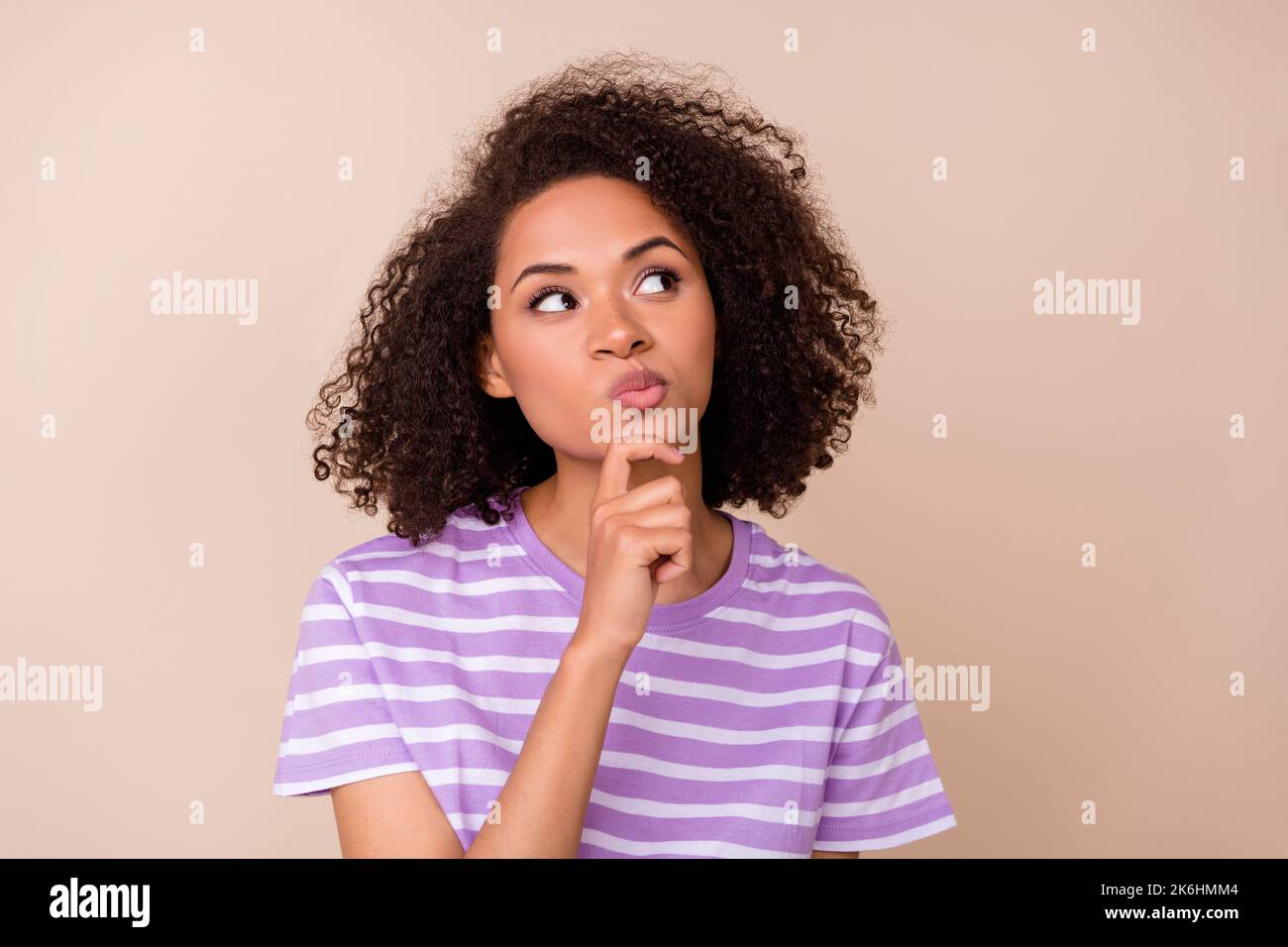 Photo of cute dreamy lady wear violet t-shirt arm chin looking empty ...
