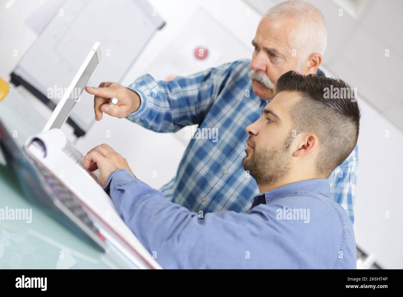 Professor helping college student computer hi-res stock photography and ...