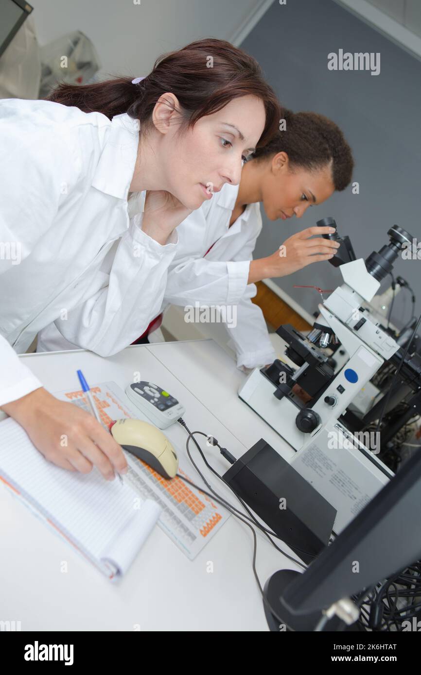 a microscope users in laboratory Stock Photo - Alamy