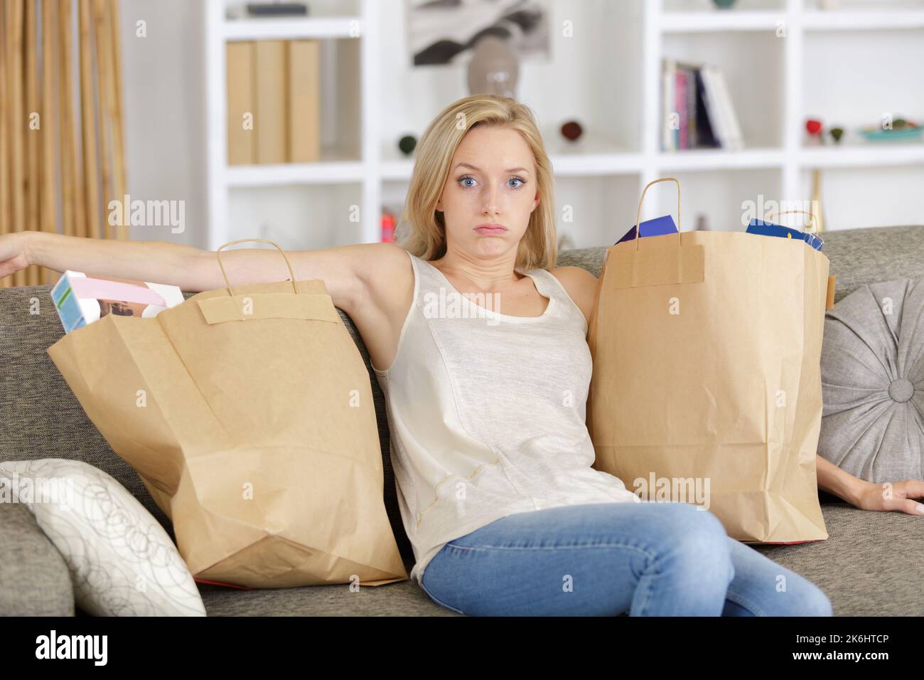 tired woman after grocery shopping Stock Photo - Alamy