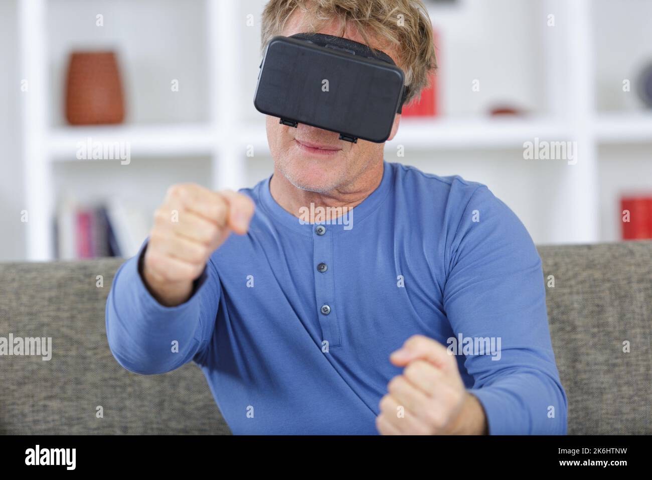 Man wearing virtual reality googles hi-res stock photography and images ...