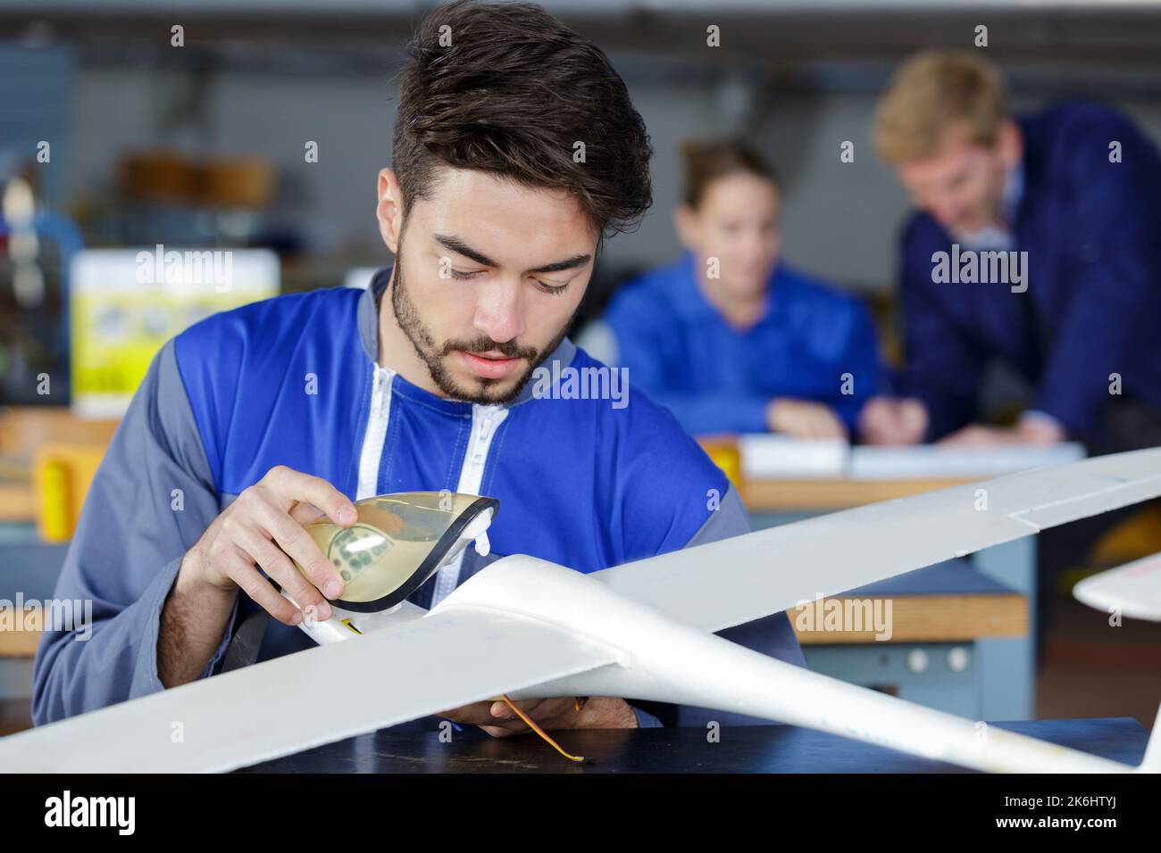 man planning and working with airplane model Stock Photo - Alamy