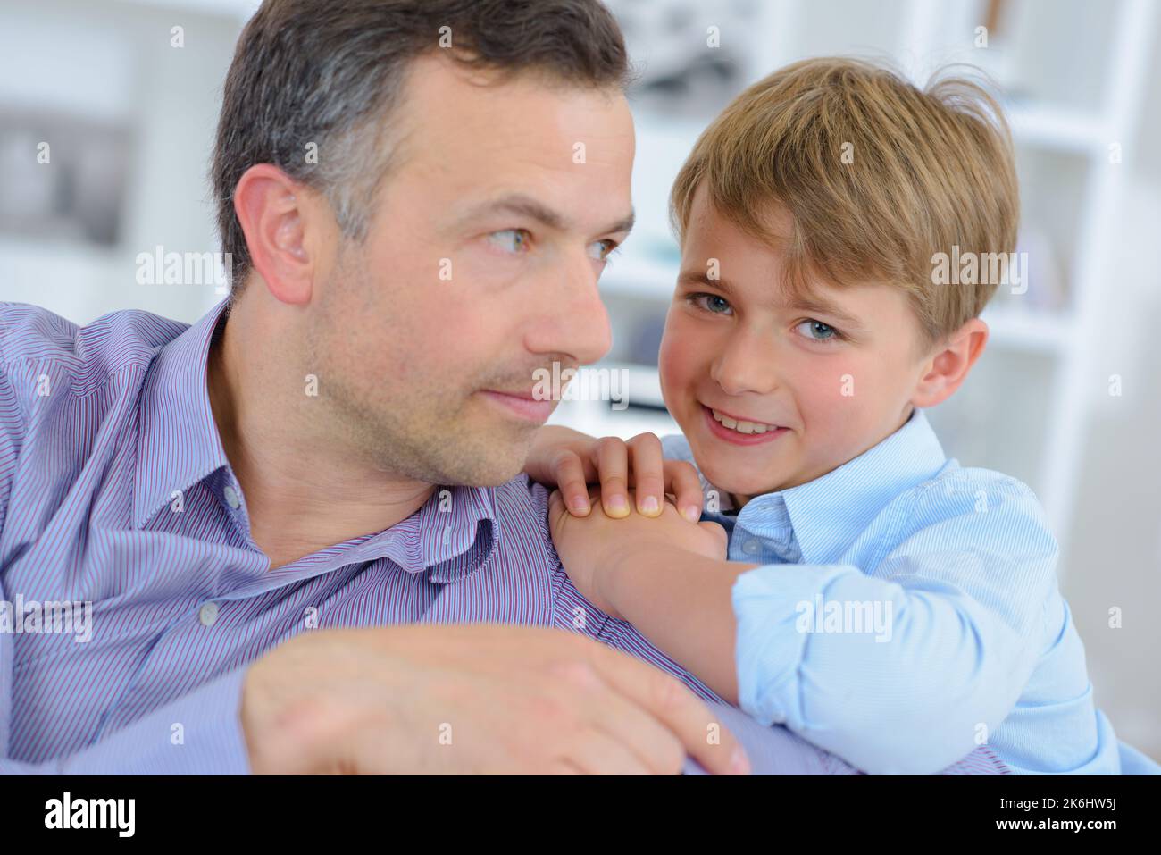 a portrait of a father and his son Stock Photo - Alamy