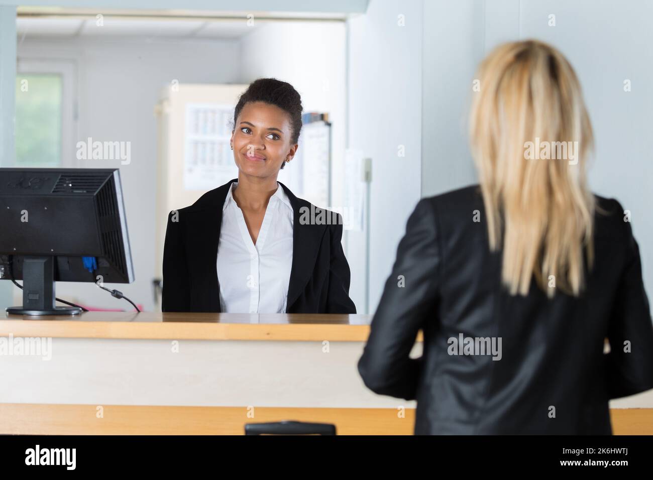 Beautiful woman check in counter hi-res stock photography and images ...